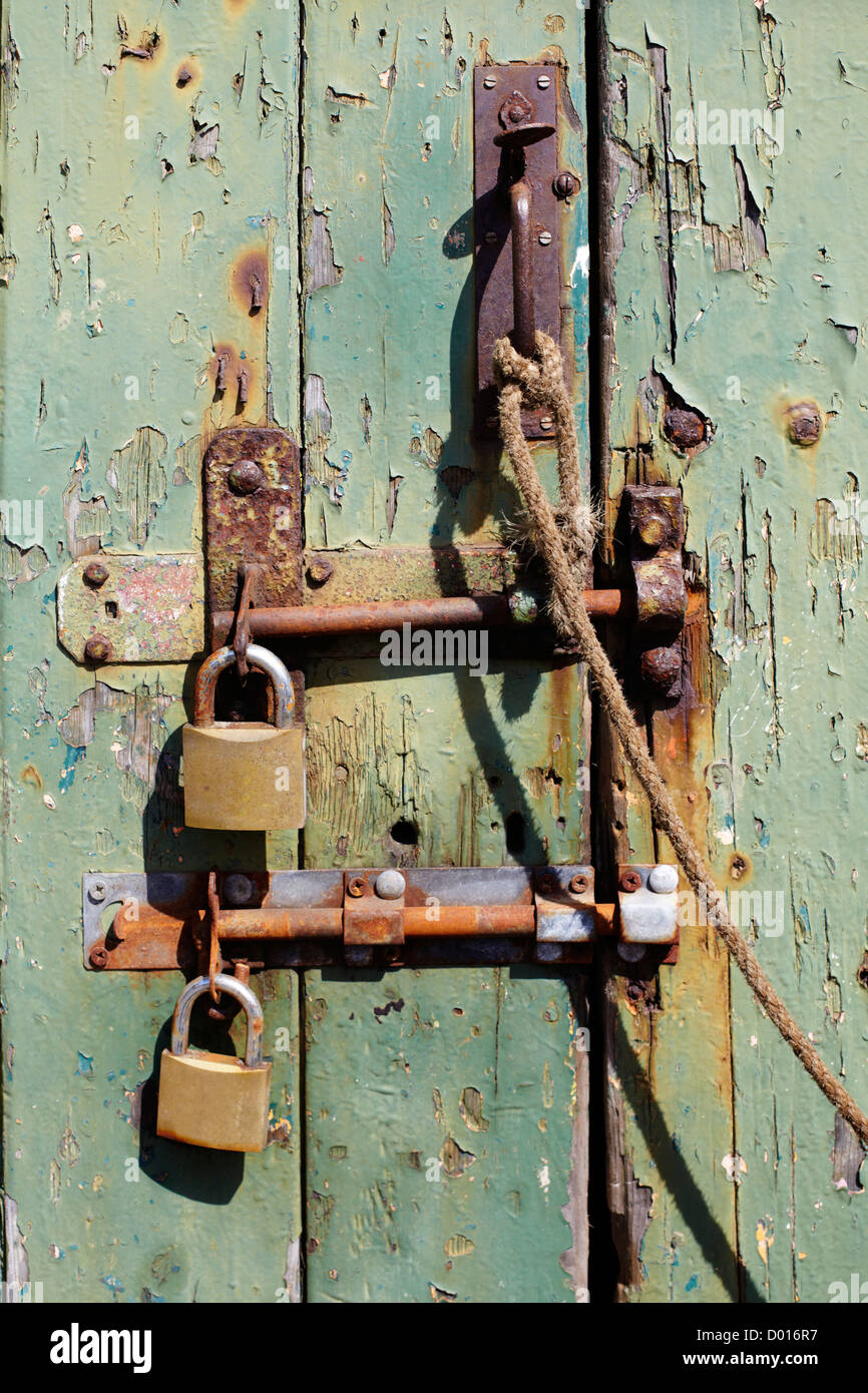 Two padlocks on one door Stock Photo - Alamy