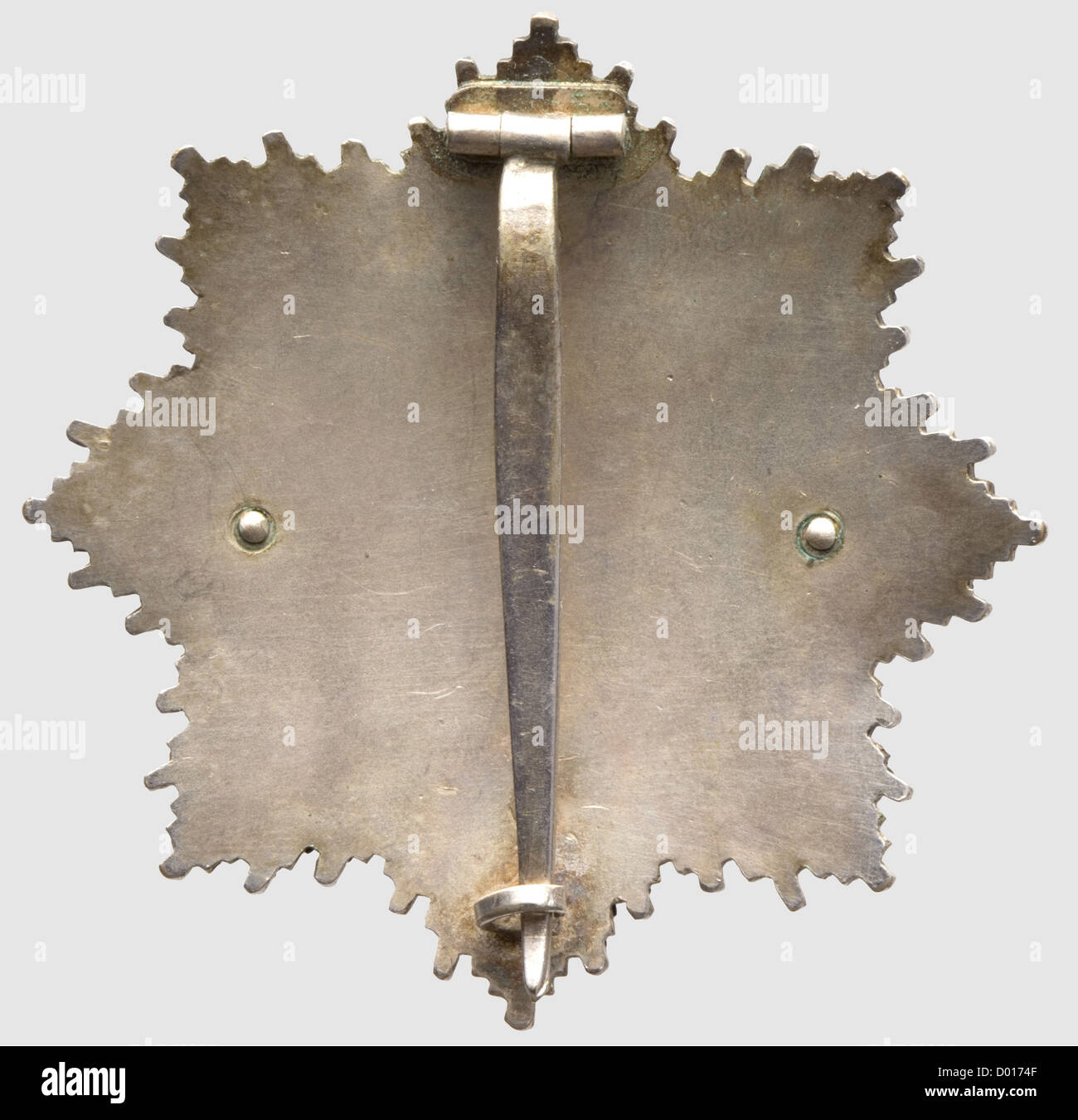 A German Cross in Silver, in "heavy" issue with four rivets, applied ...