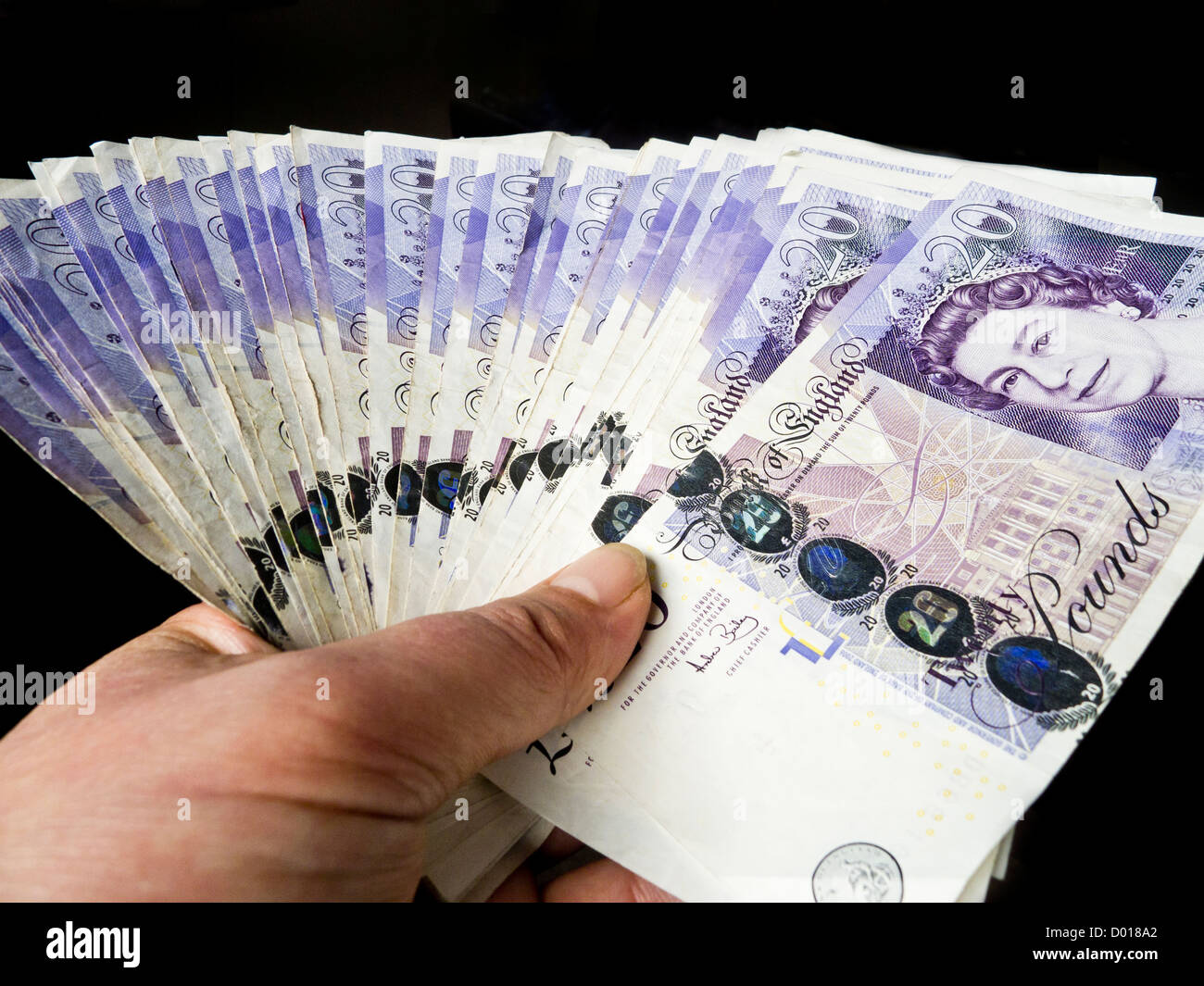 Hand money sterling notes hi-res stock photography and images - Alamy