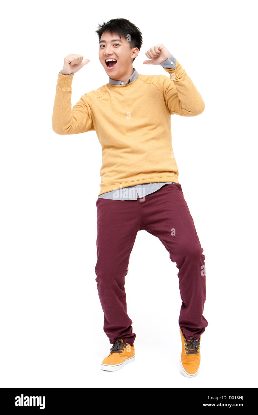 Confident young man celebrating for Chinese New Year Stock Photo - Alamy