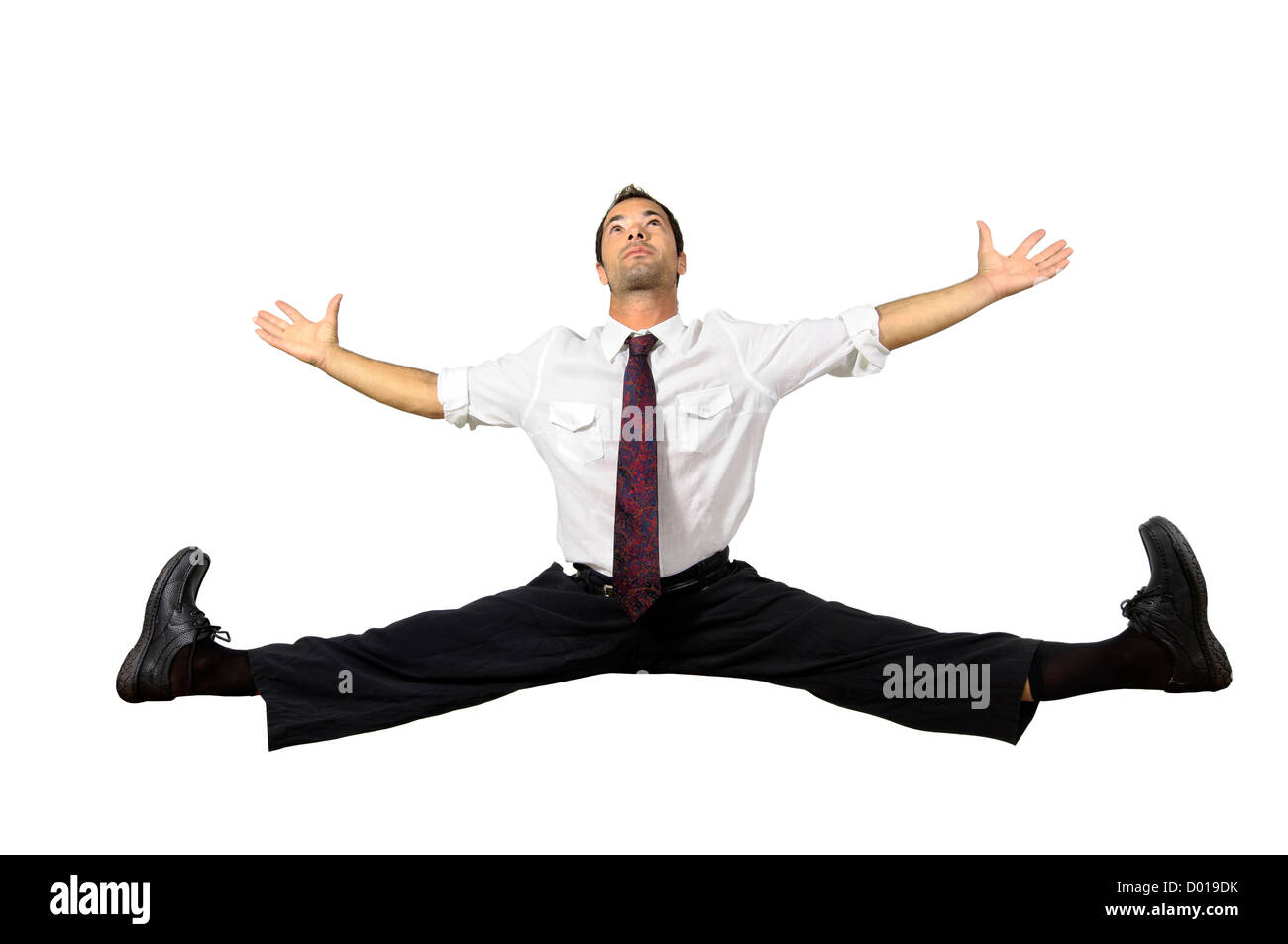 Businessman doing splits isolated in white Stock Photo - Alamy