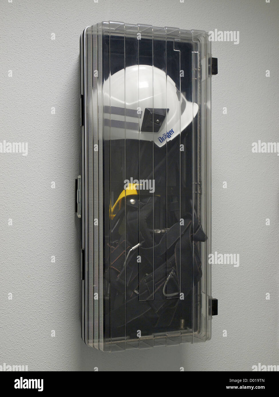 wall mounted container with personal emergency rescue equipment in a ...