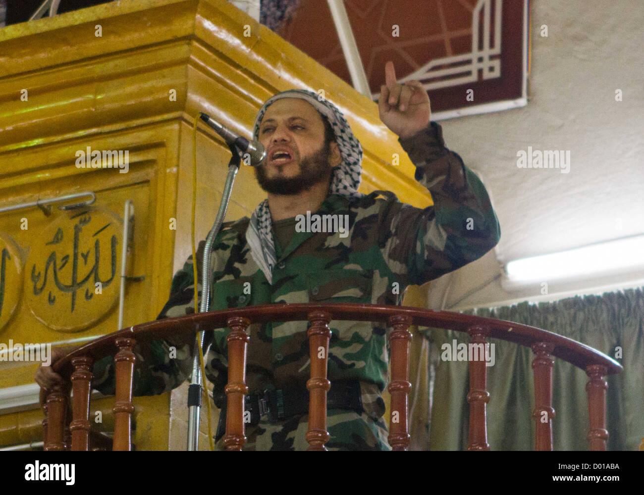 Free Syrian Army General Abu Ikereama speaks during morning prayers on ...