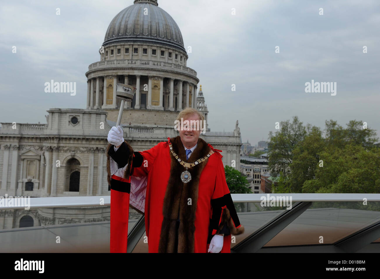 David Wootton Lord Mayor of the City of London holds the 1948 Olympic ...