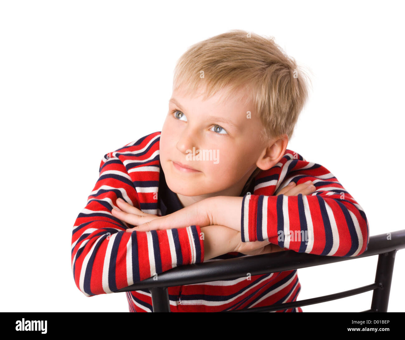 Happy seven years boy staring up isolated on white Stock Photo - Alamy