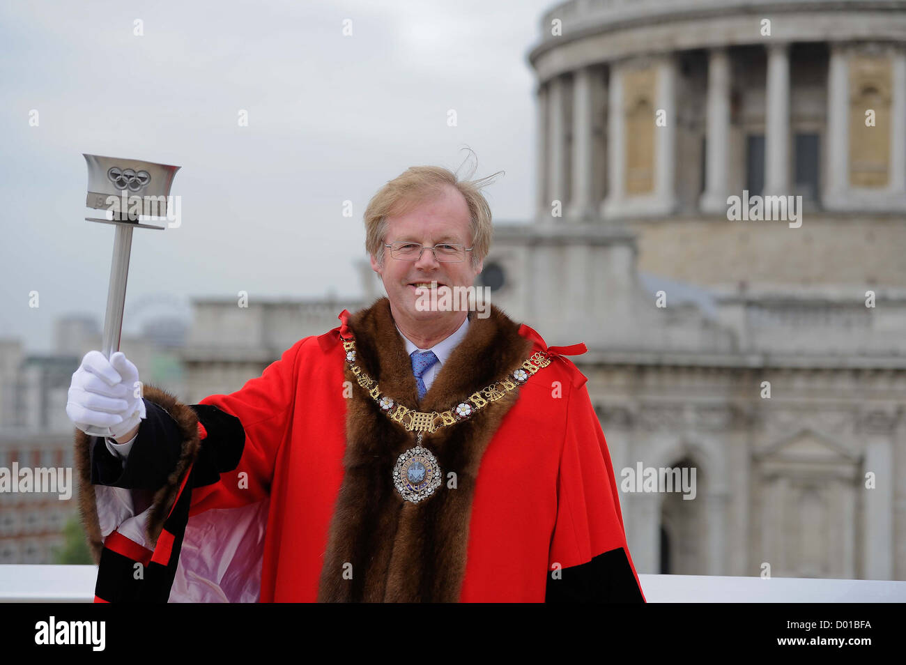 David Wootton Lord Mayor of the City of London holds the 1948 Olympic ...