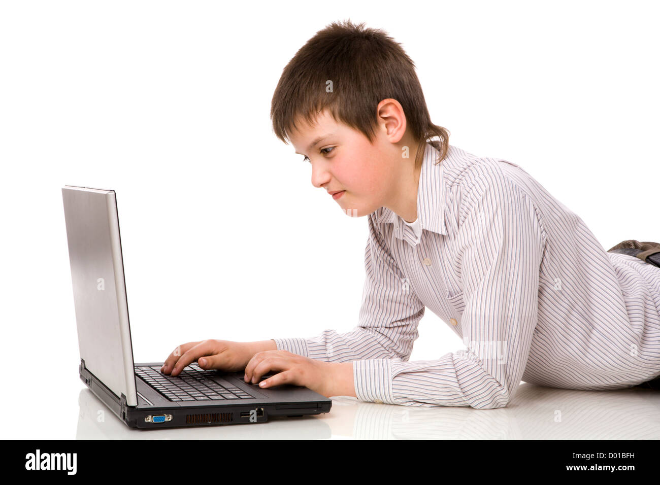Ten years Boy Surfing the net isolated on white Stock Photo - Alamy