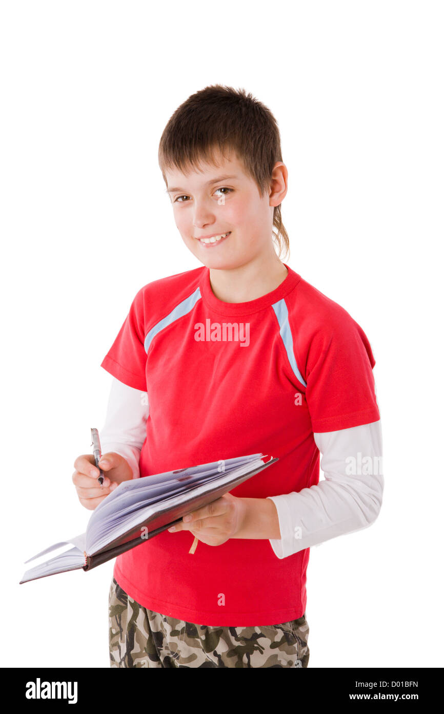 schoolboy making notes looking at you and smiling isolated Stock Photo ...