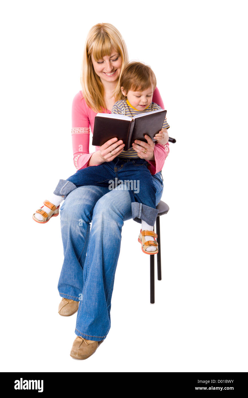 Mother reading book to her son isolated on white Stock Photo - Alamy