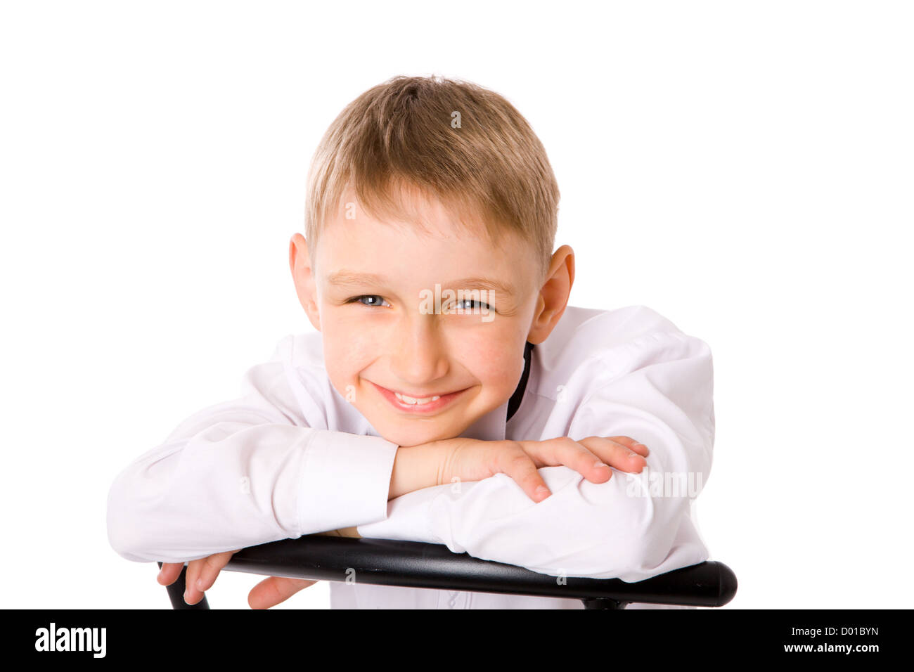 Happy seven years boy staring at you isolated Stock Photo - Alamy