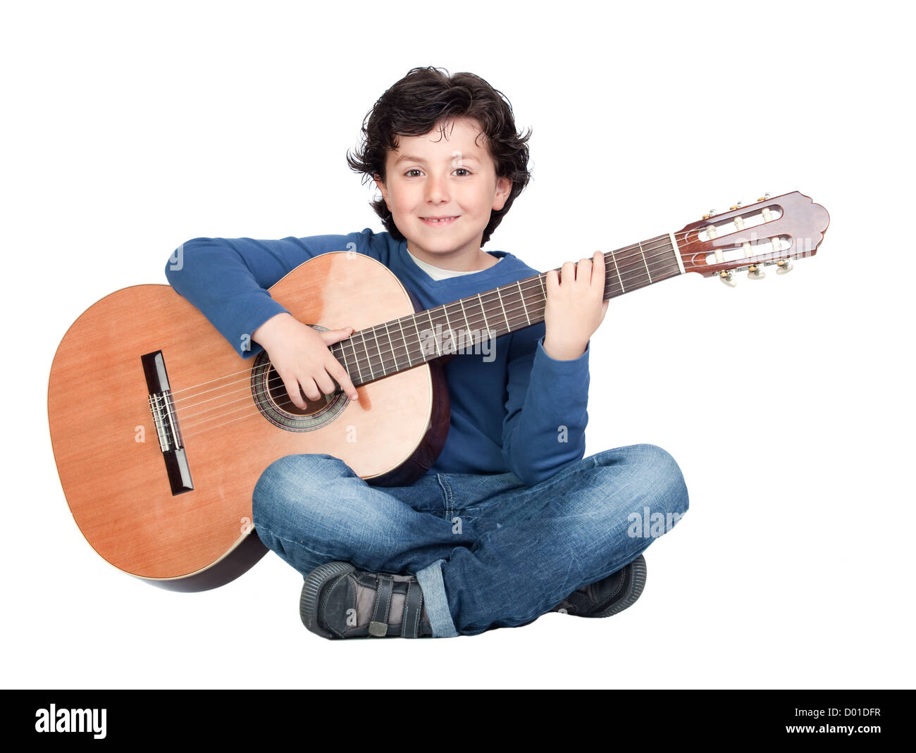 Music student playing the guitar isolated on a over white background ...