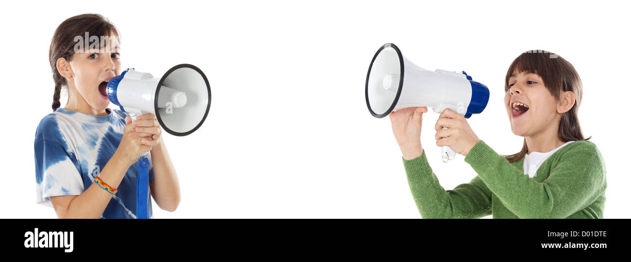 Two Little girls shouting through megaphone over white background Stock ...