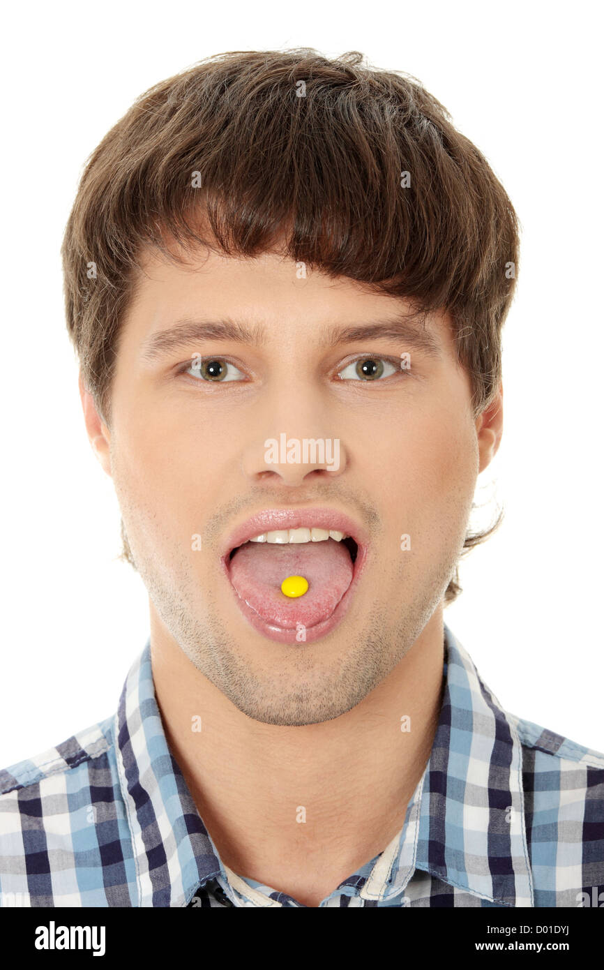 Young men taking medical pill hi-res stock photography and images - Alamy