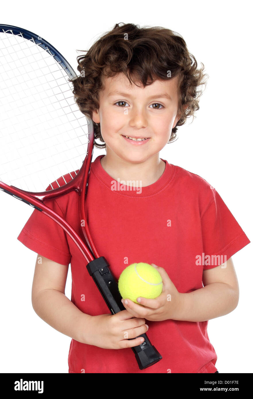Young boy with tennis racket and ball Stock Photo - Alamy