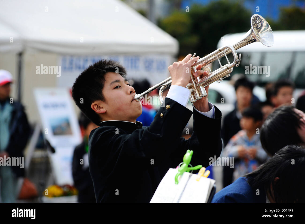 Boy playing a trumpet hi-res stock photography and images - Alamy