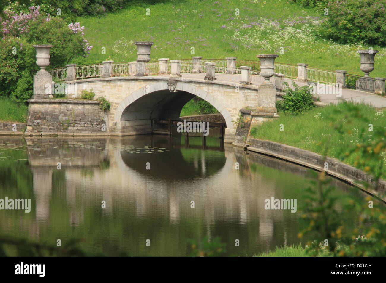 Old bridge in landscape park Stock Photo - Alamy