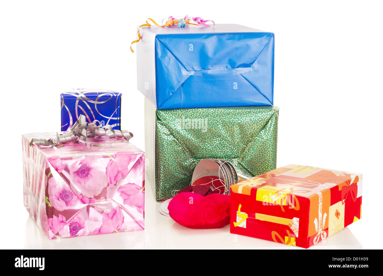 Beautiful and colorful gifts on the table Stock Photo - Alamy