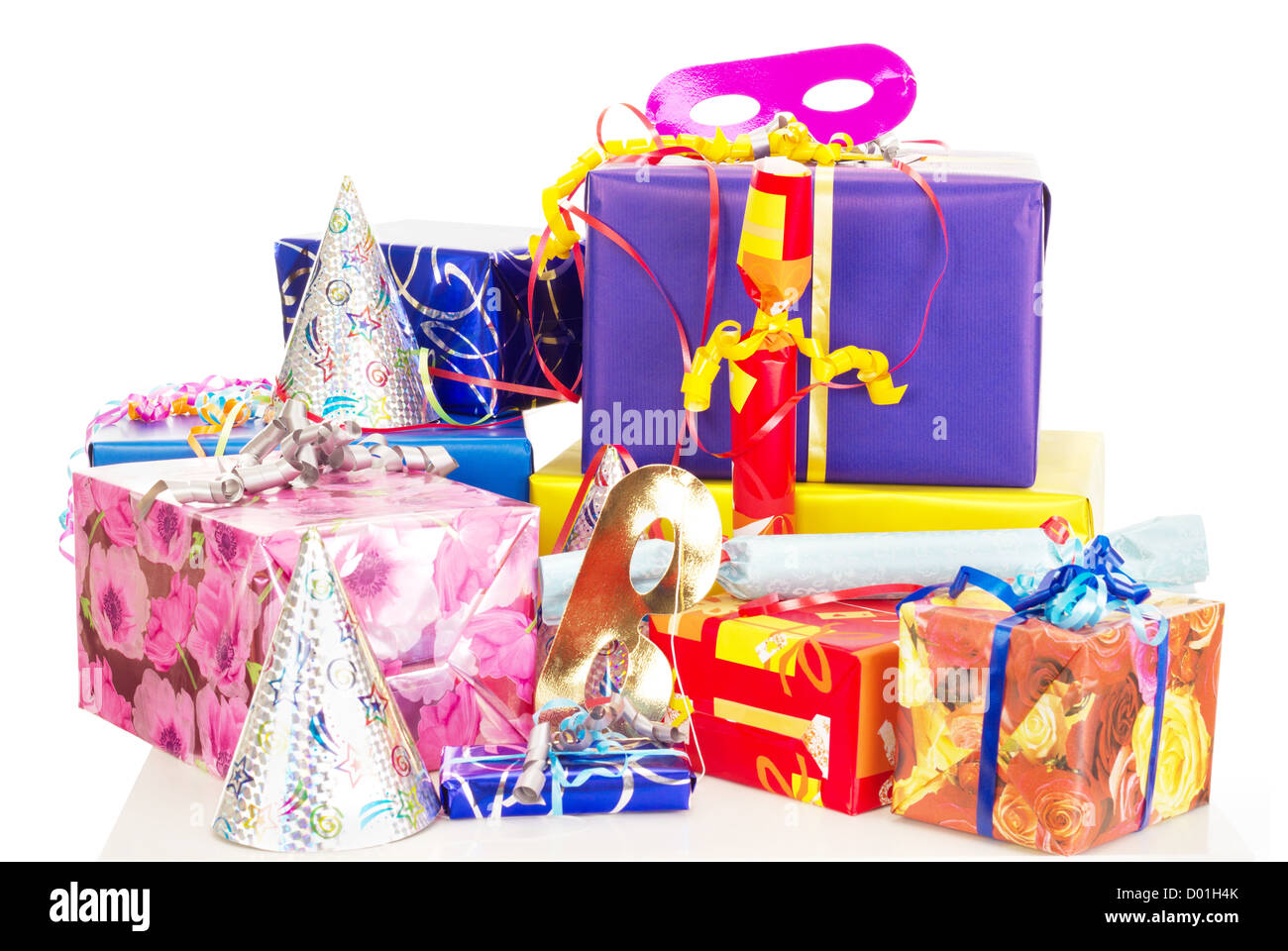 Beautiful and colorful gifts on the table Stock Photo - Alamy
