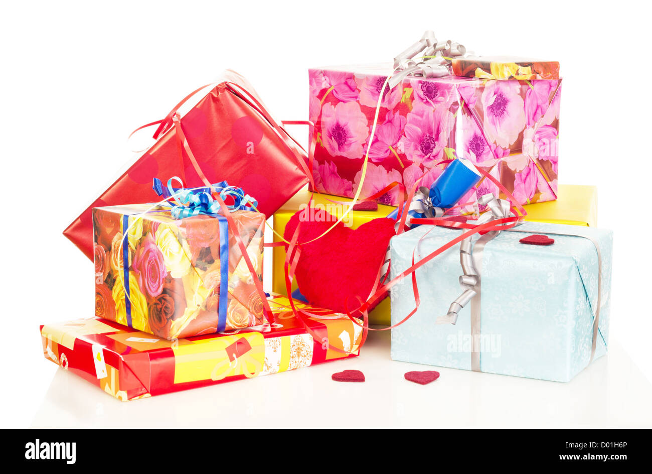 Beautiful and colorful gifts on the table Stock Photo - Alamy