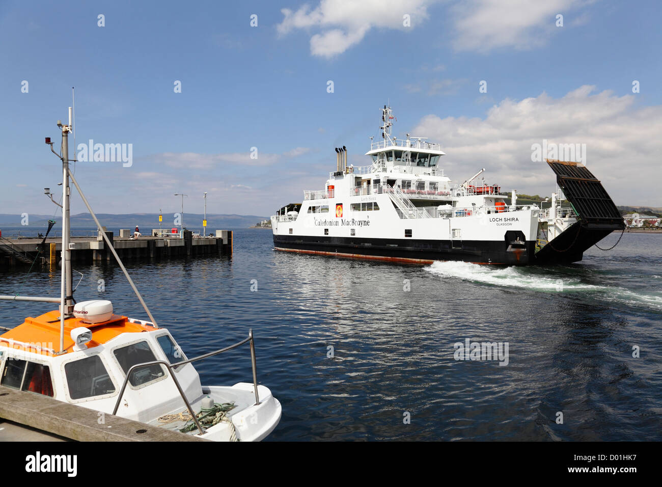 Calmac ferry departing Largs Harbour with the door open to sail to the ...