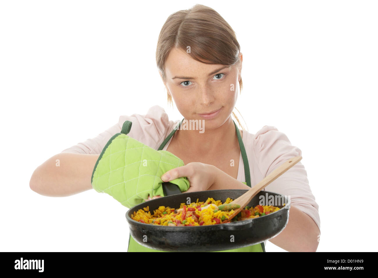 Young woman cooking Stock Photo - Alamy