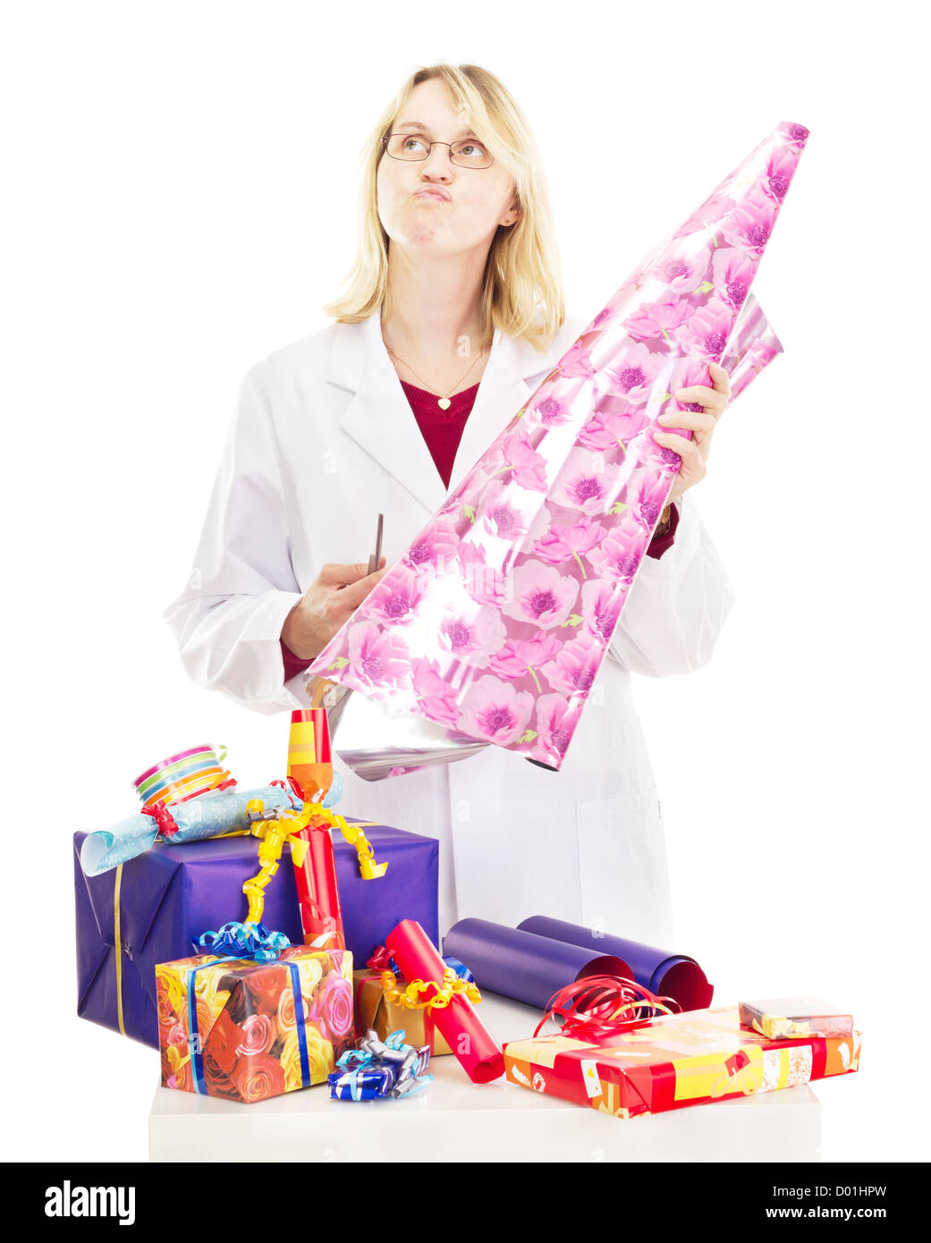 Person packaging some colorful gifts Stock Photo - Alamy