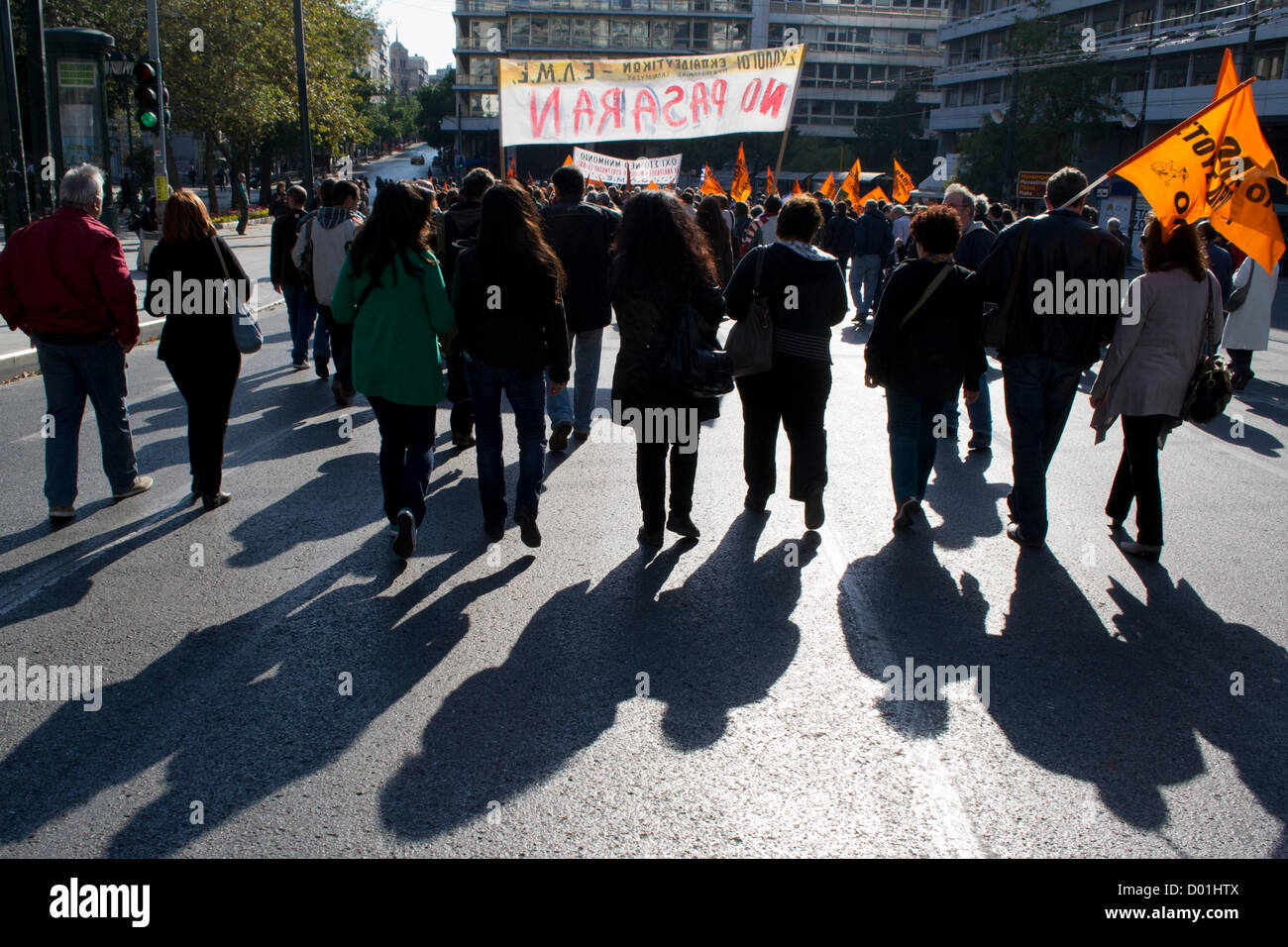 Shadows of marching protesters Stock Photo - Alamy