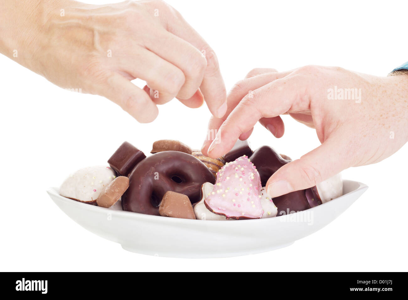 People eating some delicate gingerbreads Stock Photo - Alamy
