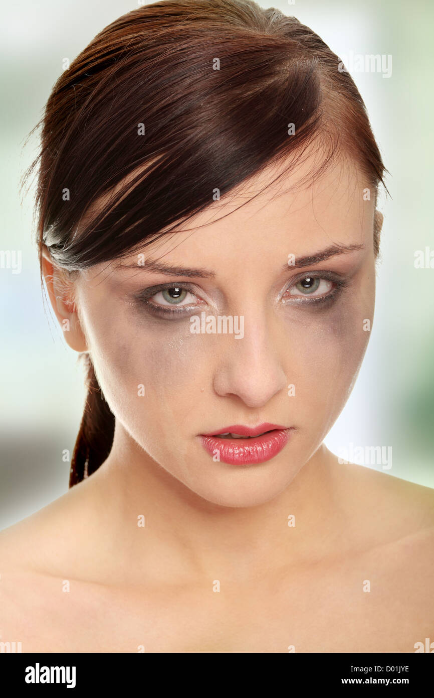 Abused woman crying Stock Photo - Alamy