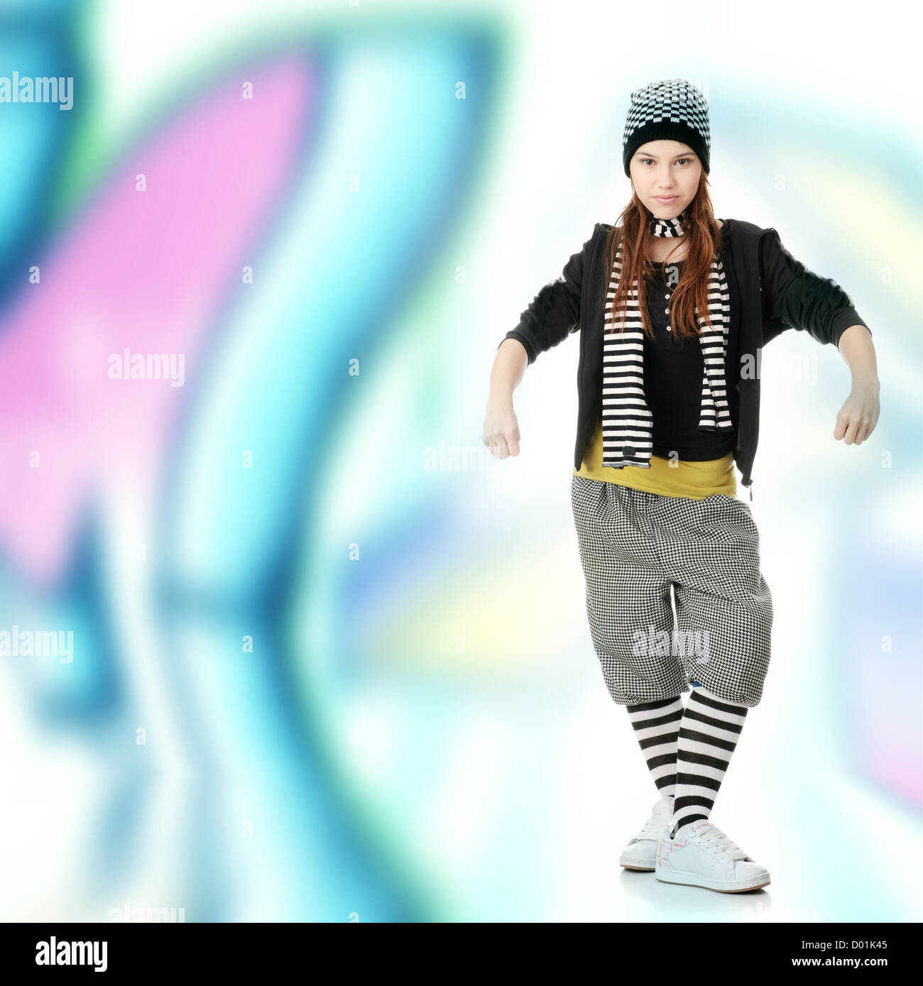 Young funky dancer against abstract grafitti background Stock Photo - Alamy