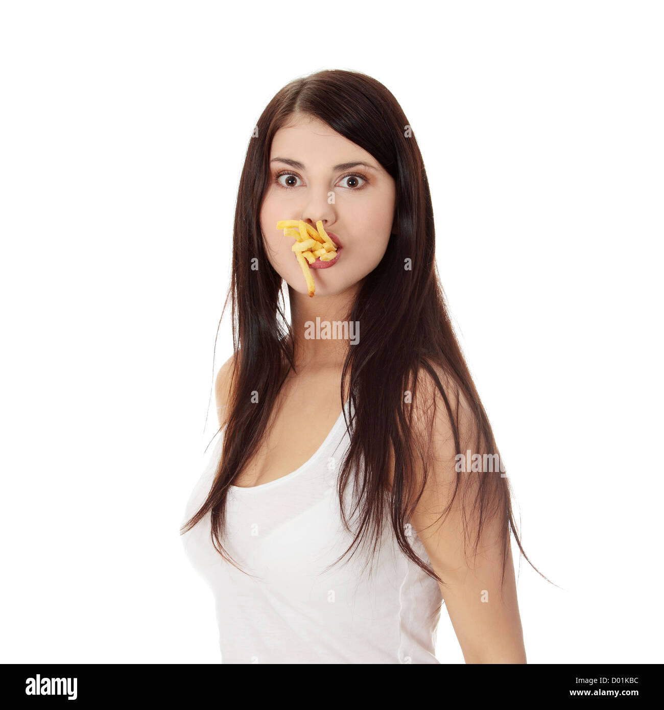 Young woman eating fries Stock Photo - Alamy
