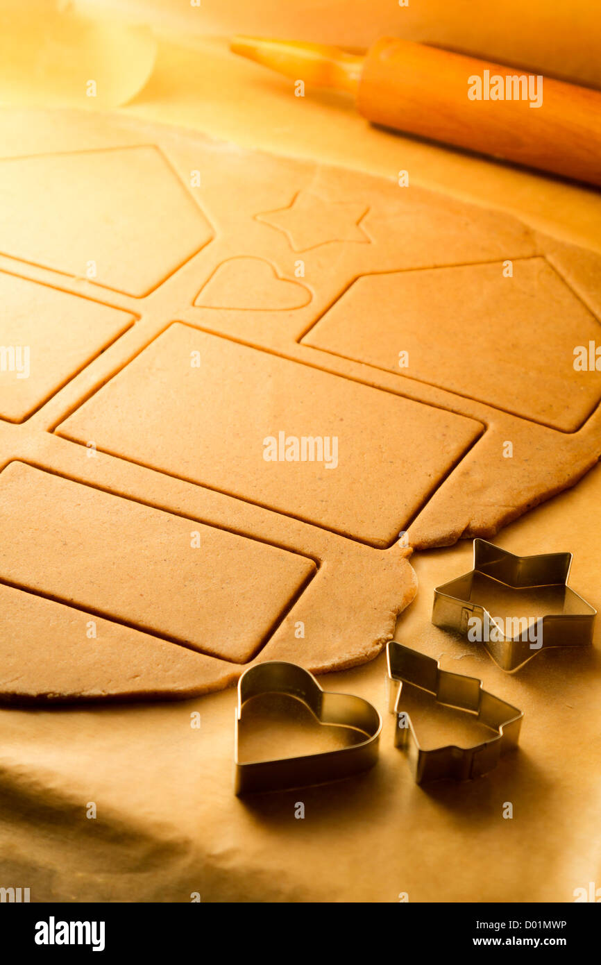 Cut different shapes of gingerbread cookies Stock Photo - Alamy