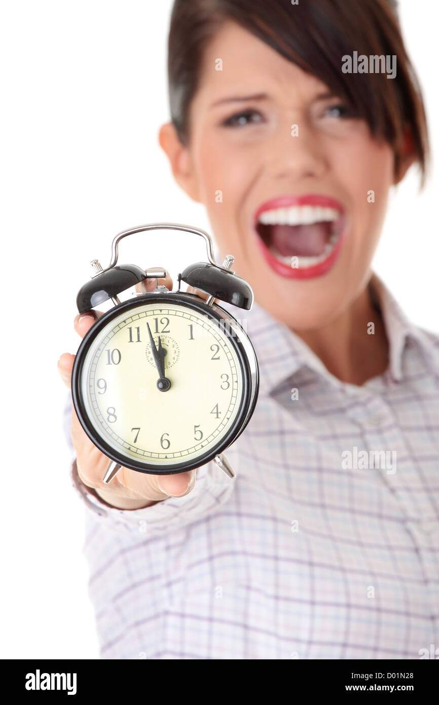 Business woman with alarm clock Stock Photo - Alamy