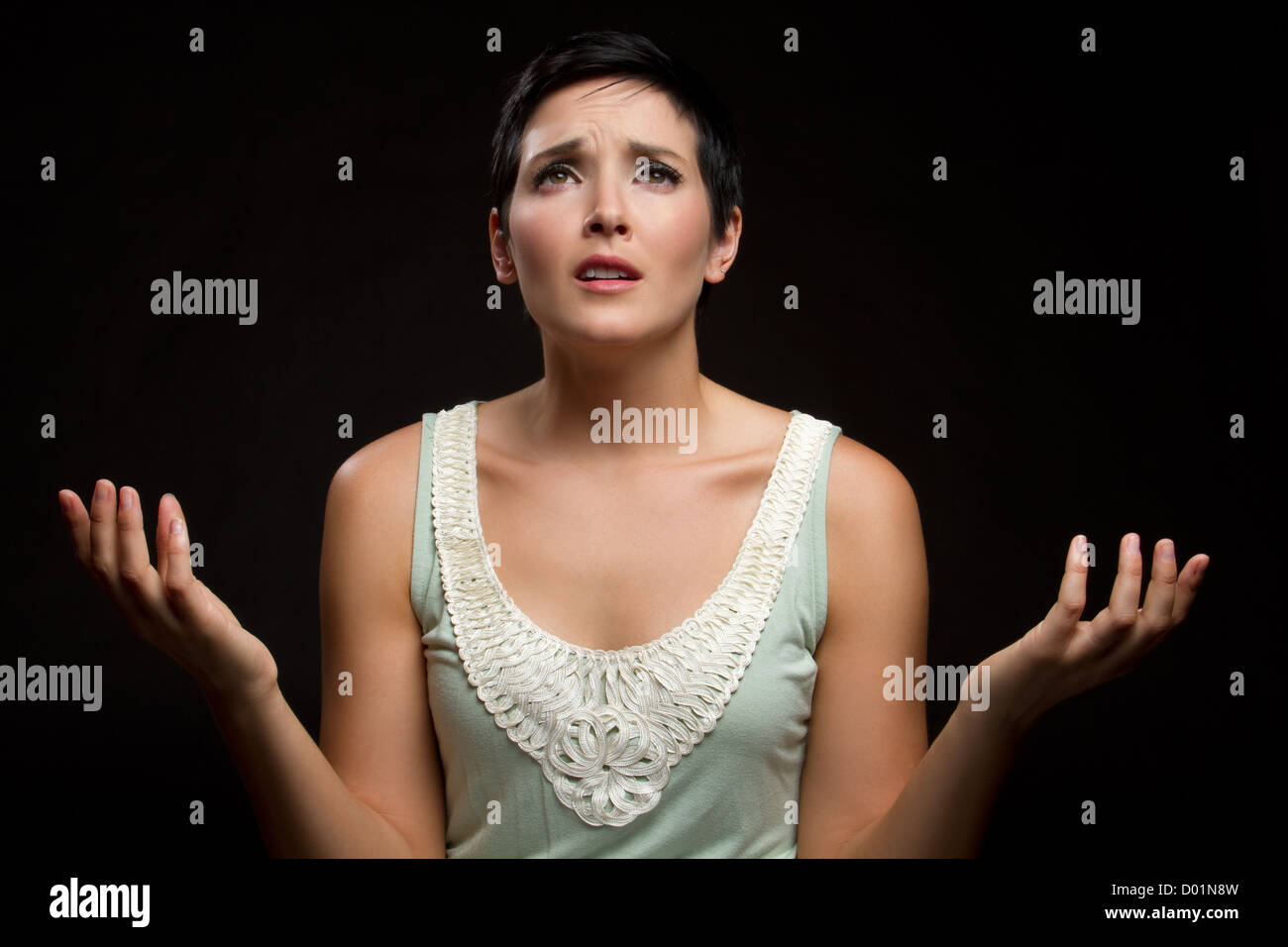 Young sad christian woman praying Stock Photo - Alamy