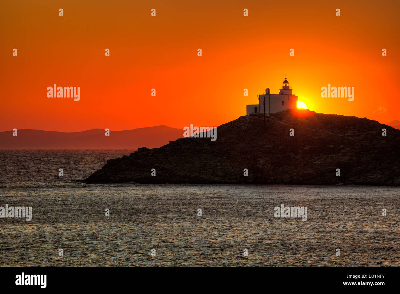 The lighthouse at the port of Korissia on the island of Kea, Greece ...