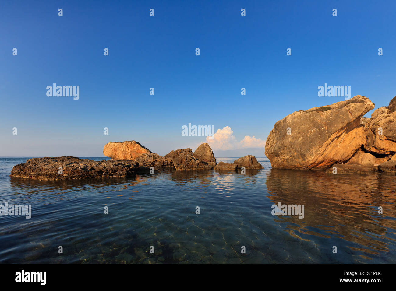 stones in sea Stock Photo - Alamy