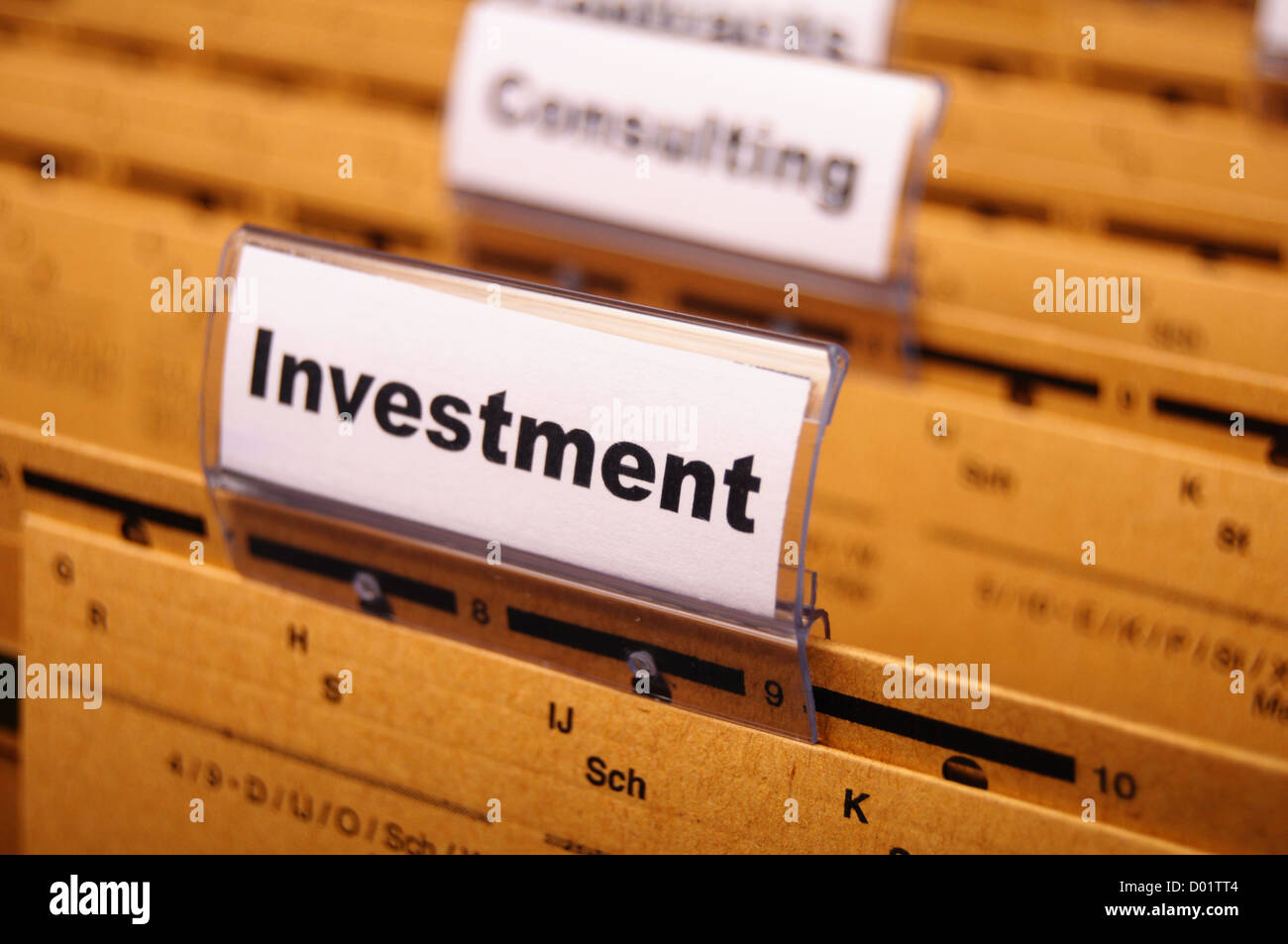 investment word on business folder showing financial success concept ...