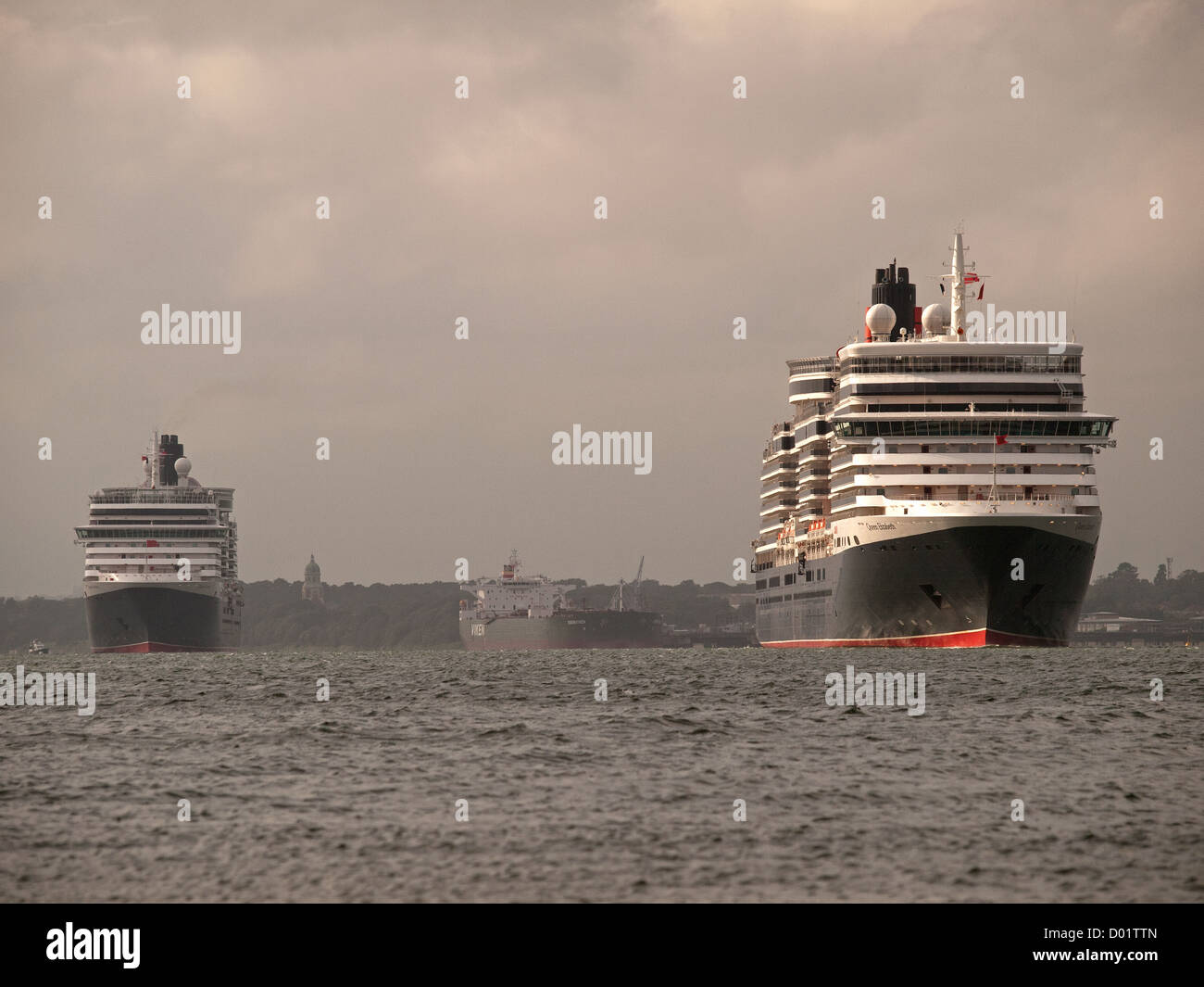 Cunard cruise ships Queen Victoria (left) and Queen Elizabeth leaving ...