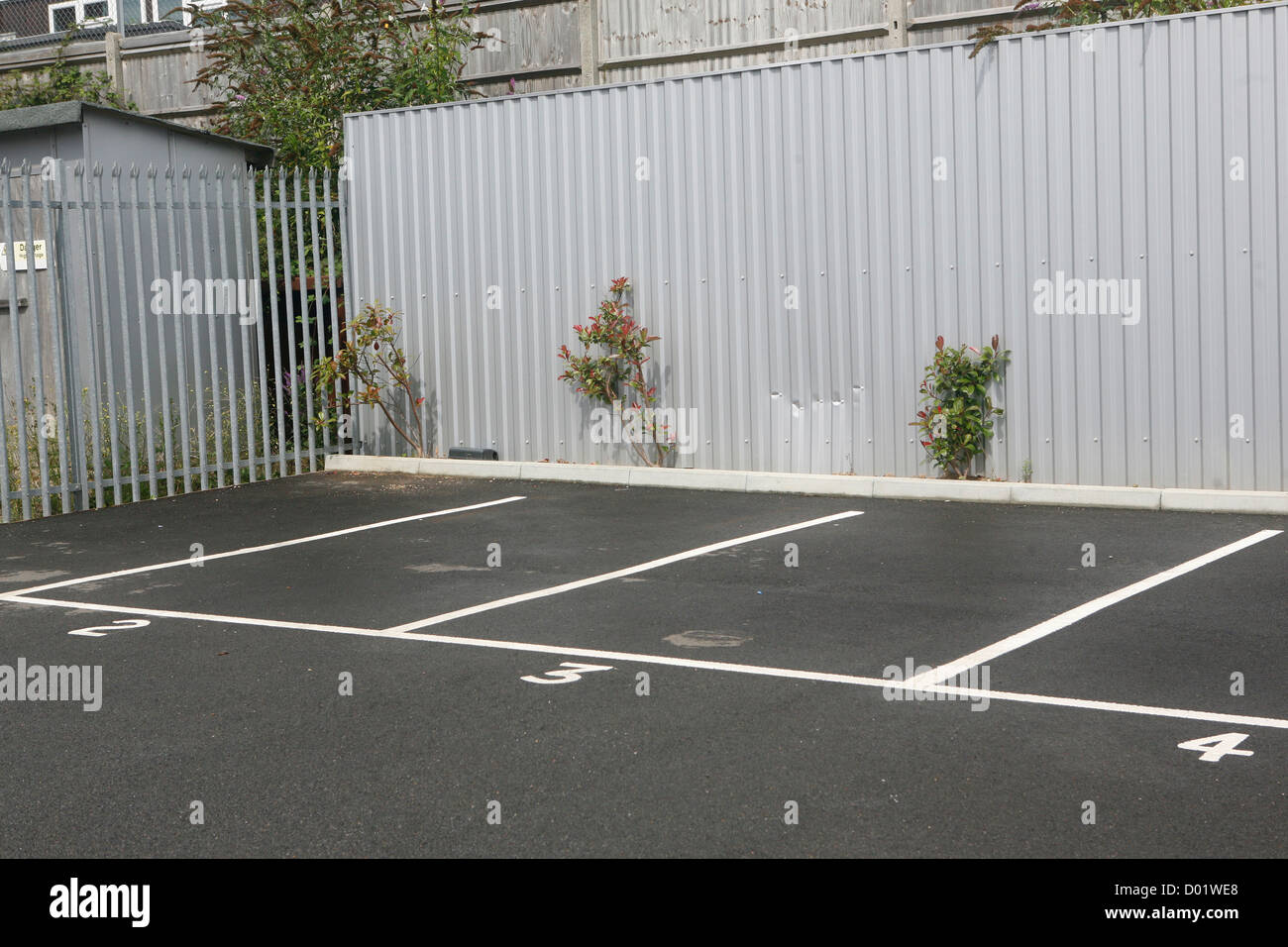 Empty numbered car parking spaces in a car park Stock Photo - Alamy