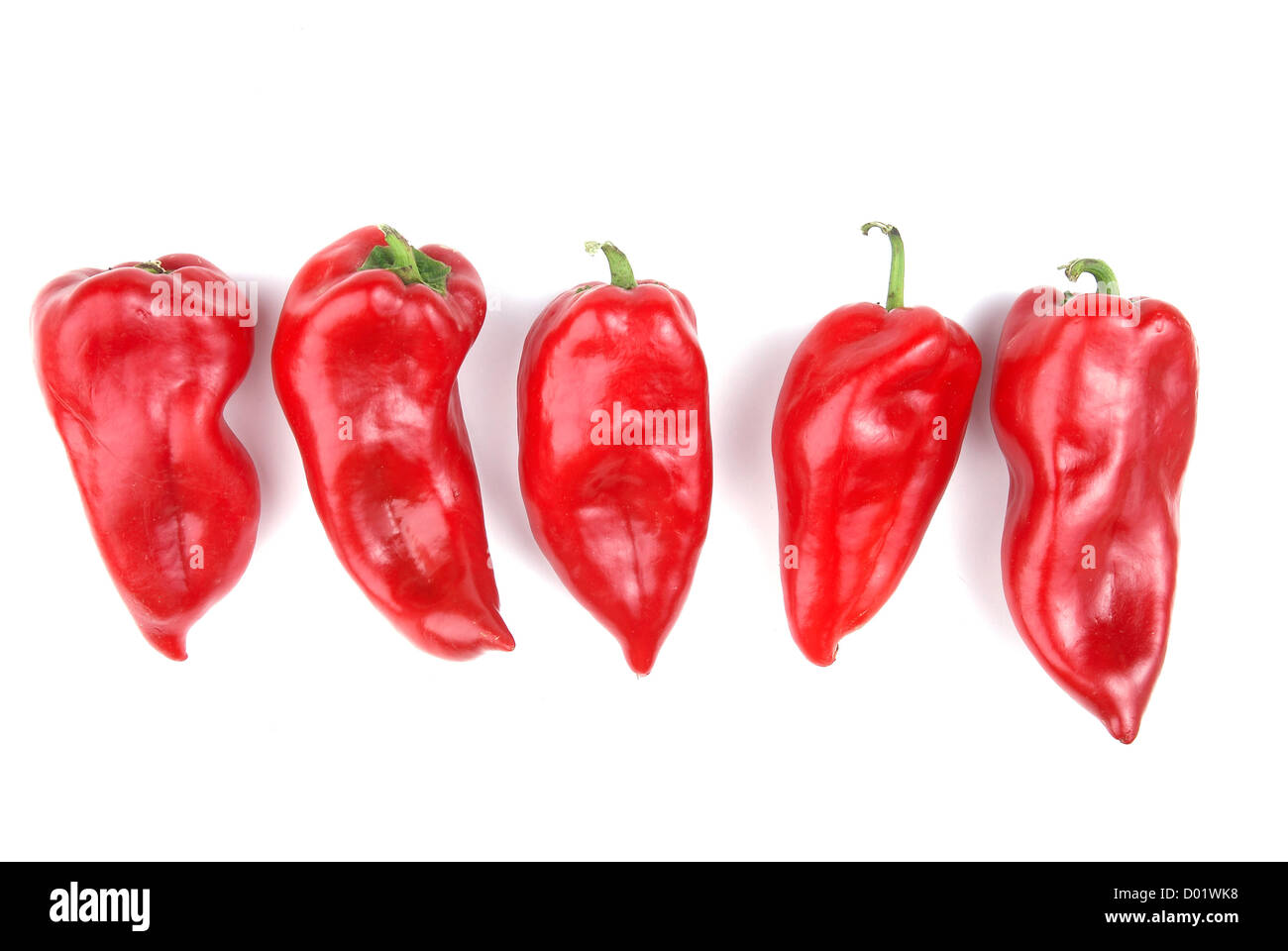 Group of Red pepper isolated on white Stock Photo - Alamy
