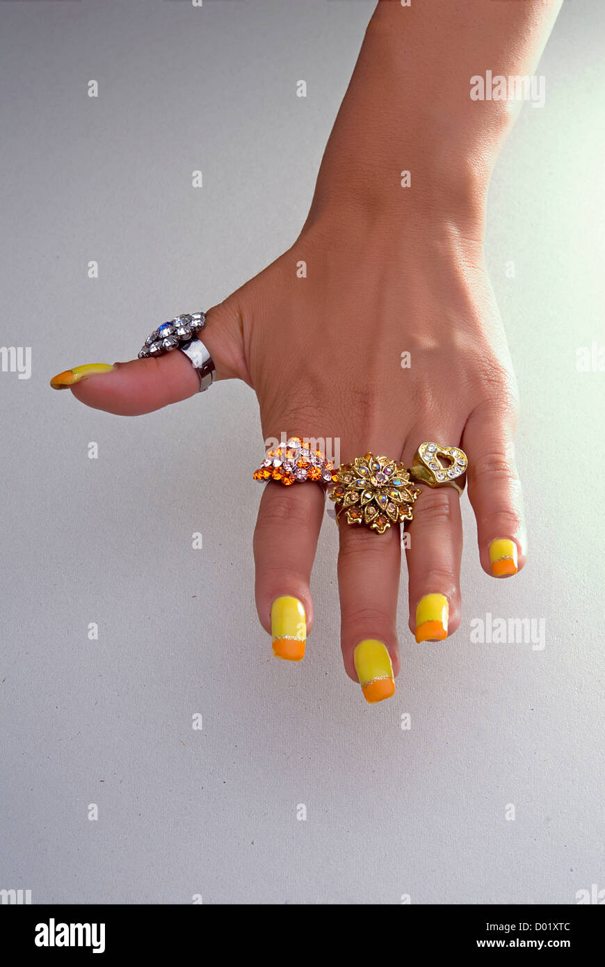 Hand with big rings Stock Photo - Alamy