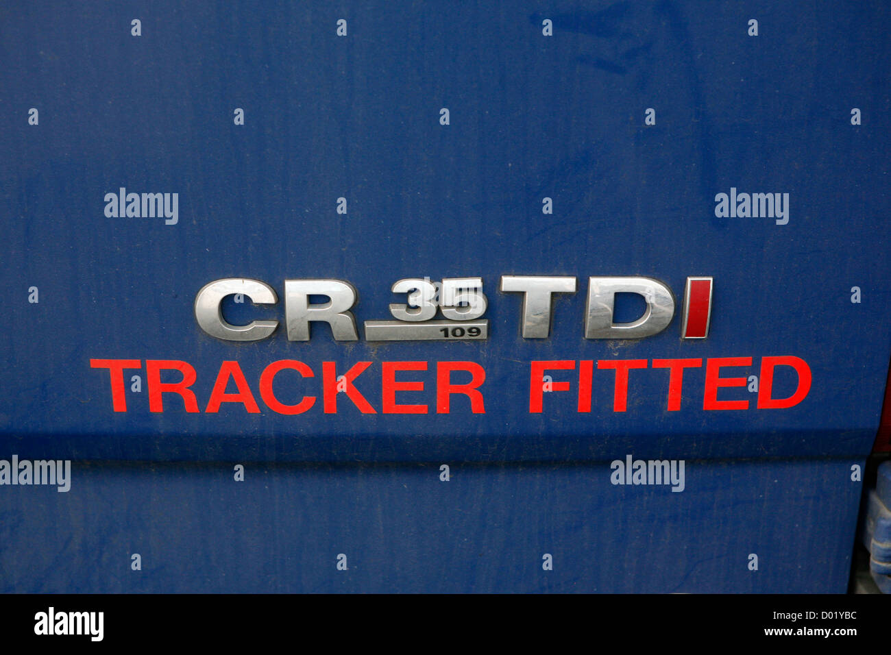 A tracker fitted security sticker on the back of a van Stock Photo - Alamy