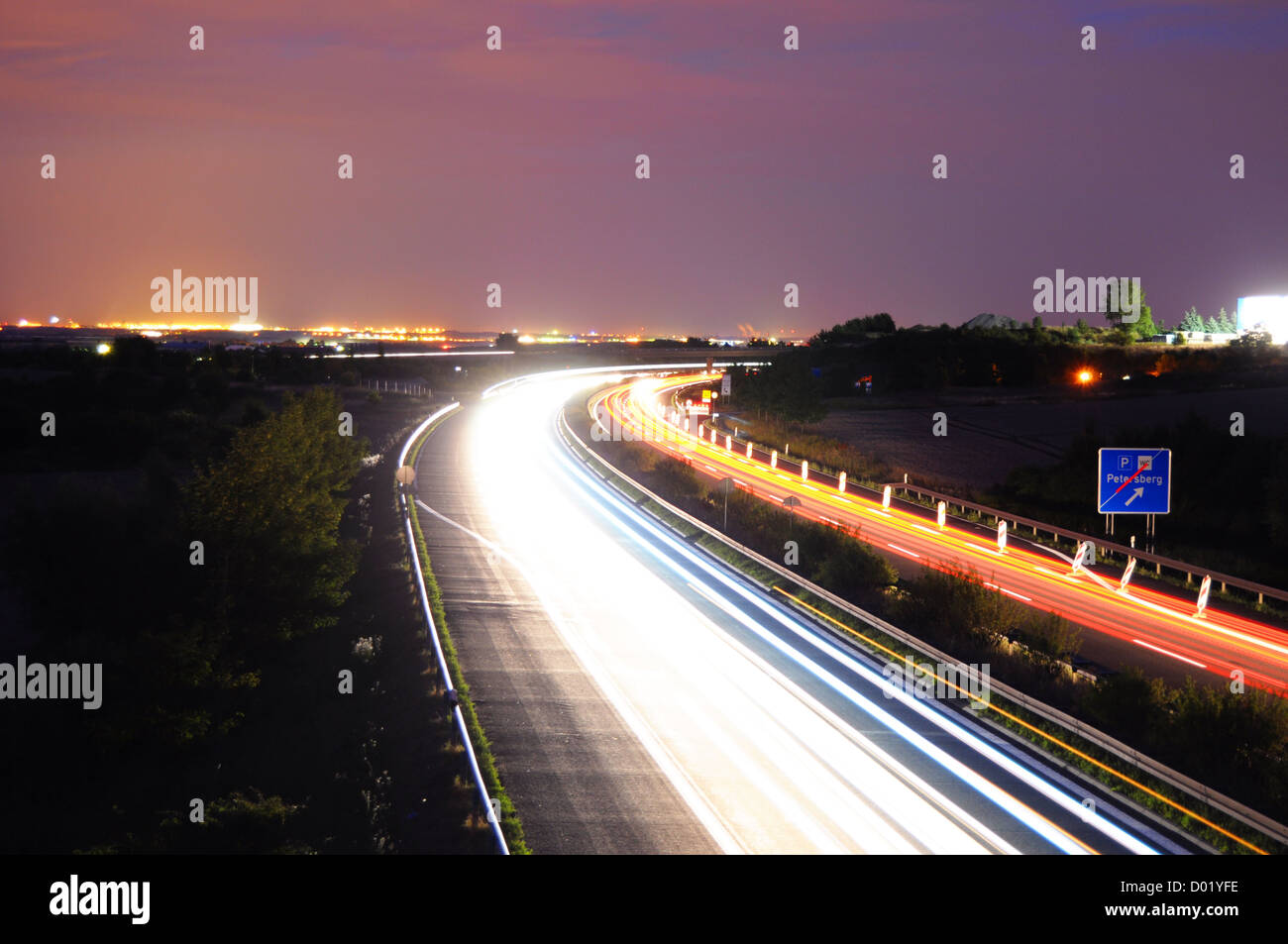 night time traffic on highway with lights showing transportation ...