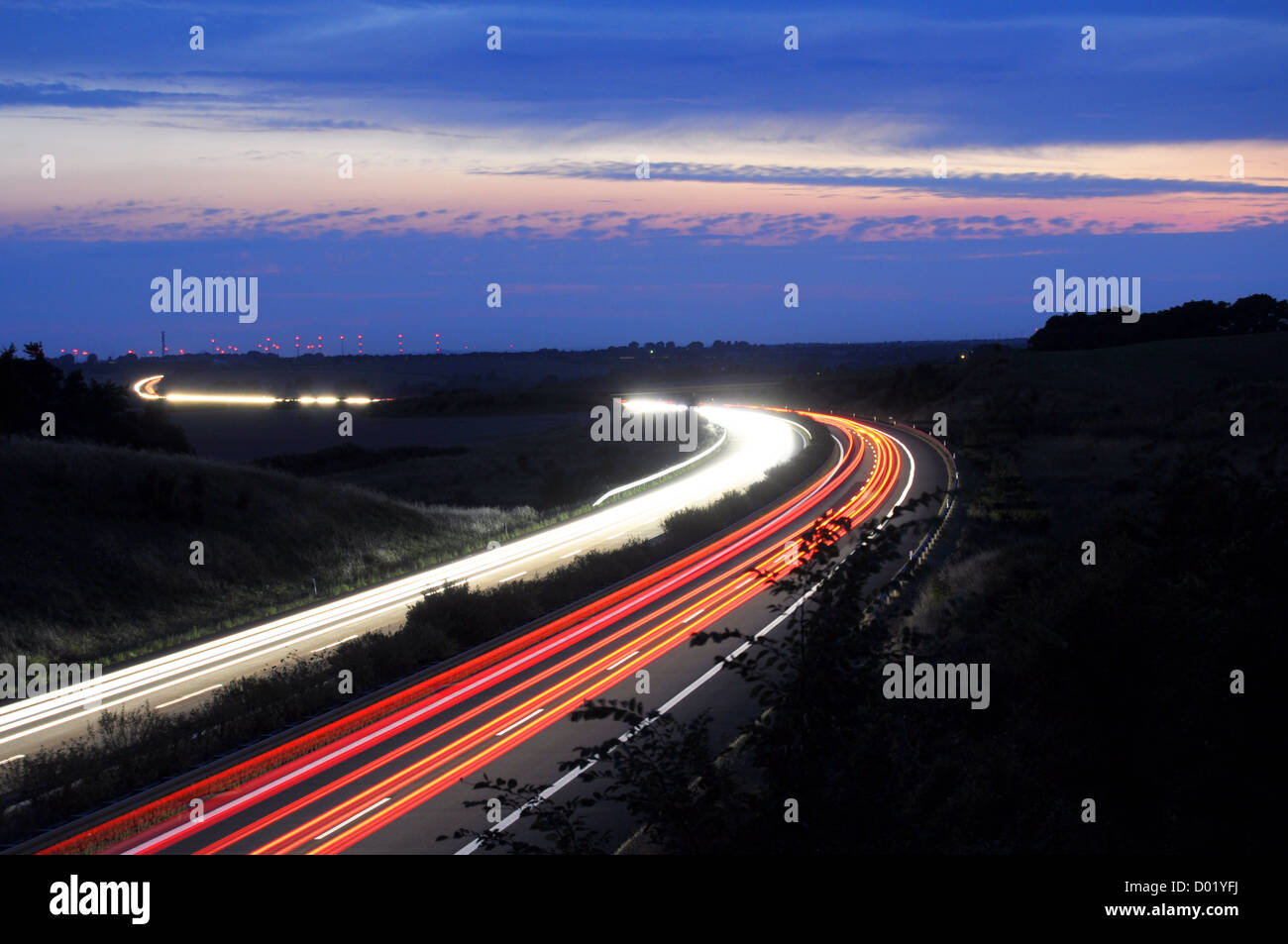 night time traffic on highway with lights showing transportation ...