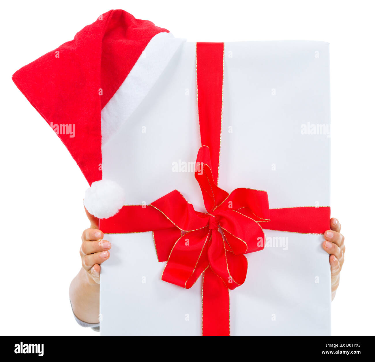 Big Christmas present box with Santa hat Stock Photo - Alamy