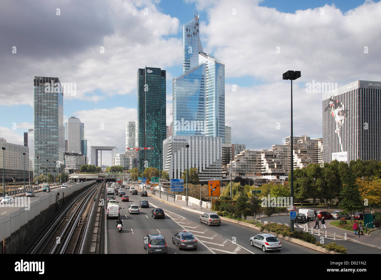 Av. Charles de Gaulle and skyline of La Défense in Paris with Tour ...