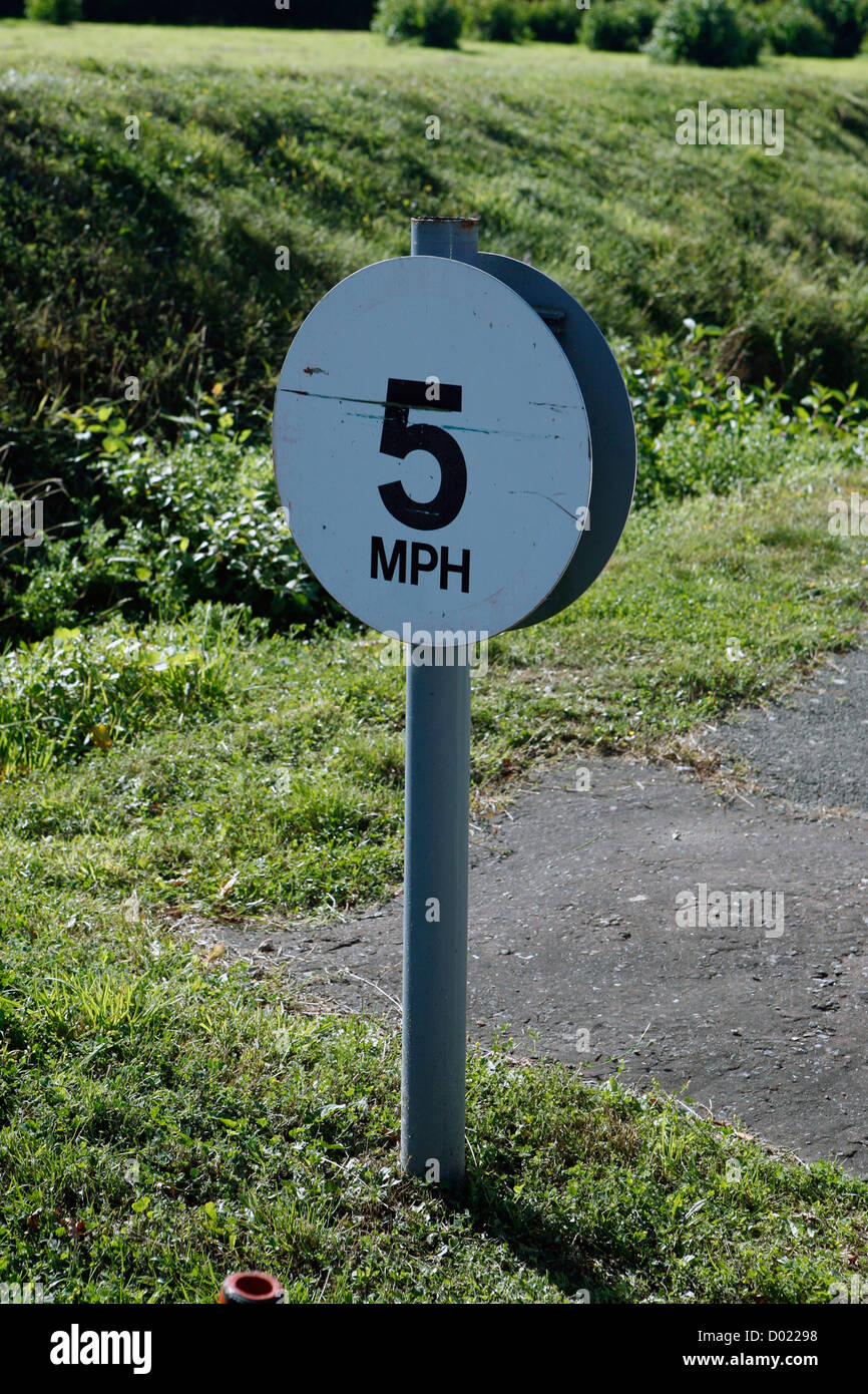 A small 5mph speed limit sign in an industrial estate in the UK Stock ...