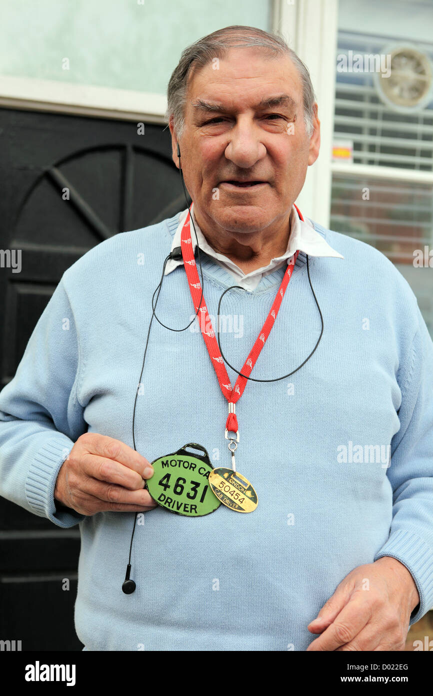 London taxi driver badge hi-res stock photography and images - Alamy