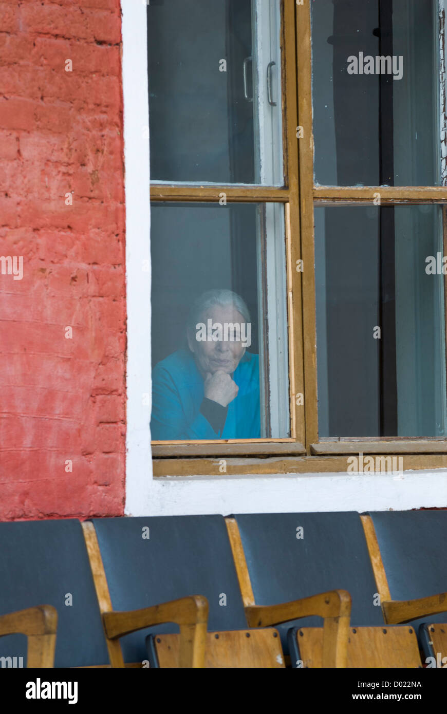 old woman granny window looking alone Stock Photo - Alamy