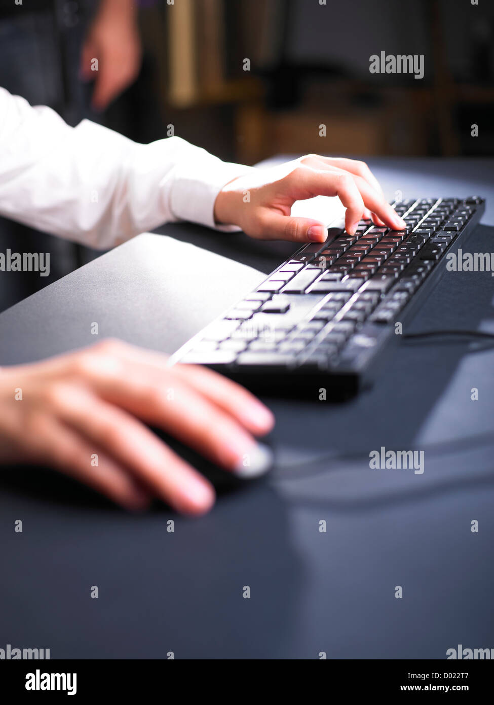 Business Secretary Typing on Computer Keyboard Stock Photo - Alamy